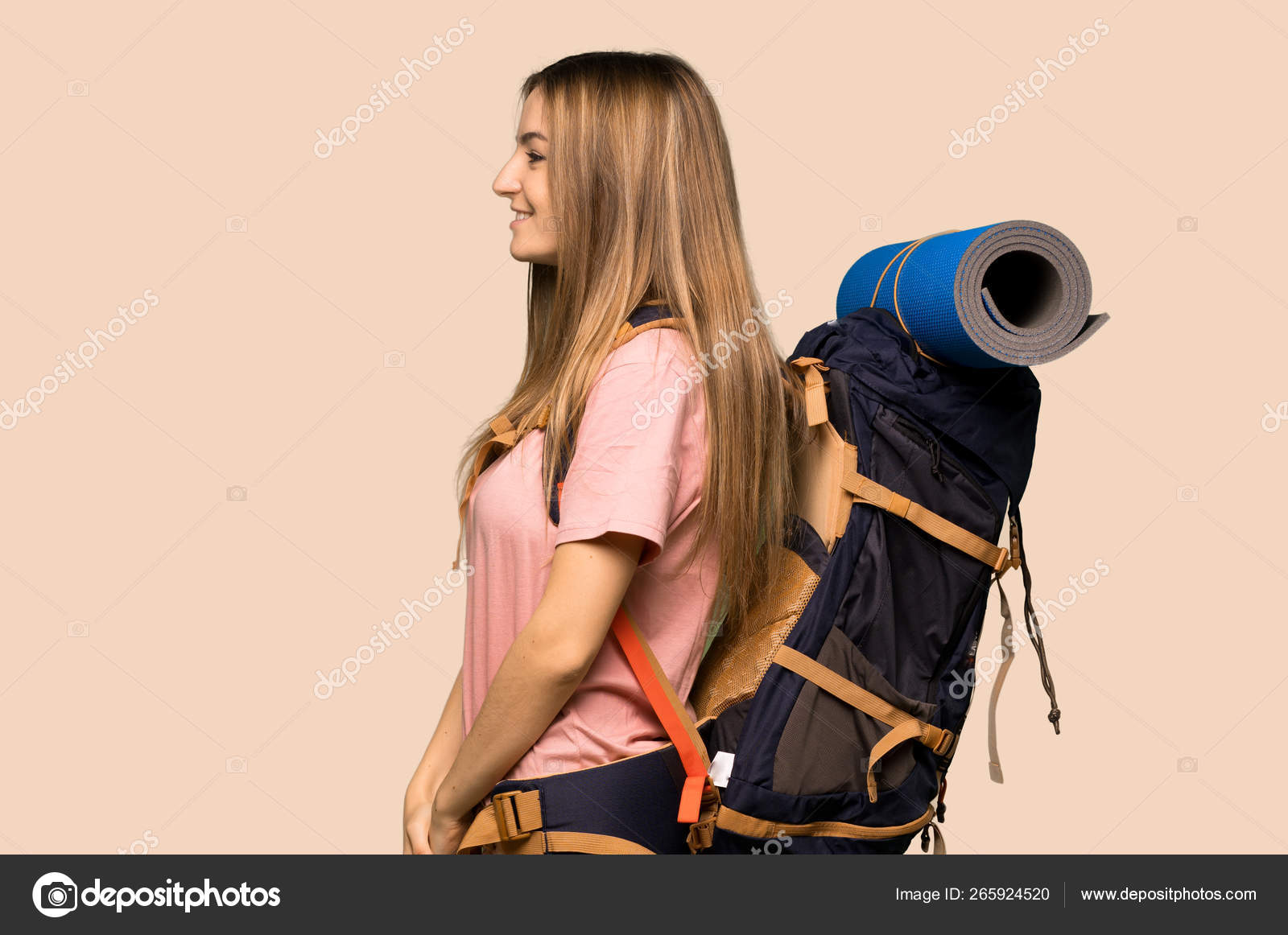 Young Backpacker Woman Lateral Position Isolated Yellow Background ...