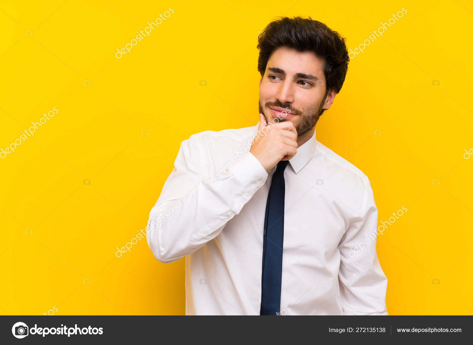 Businessman Isolated Yellow Background Thinking Idea Stock Photo by ...