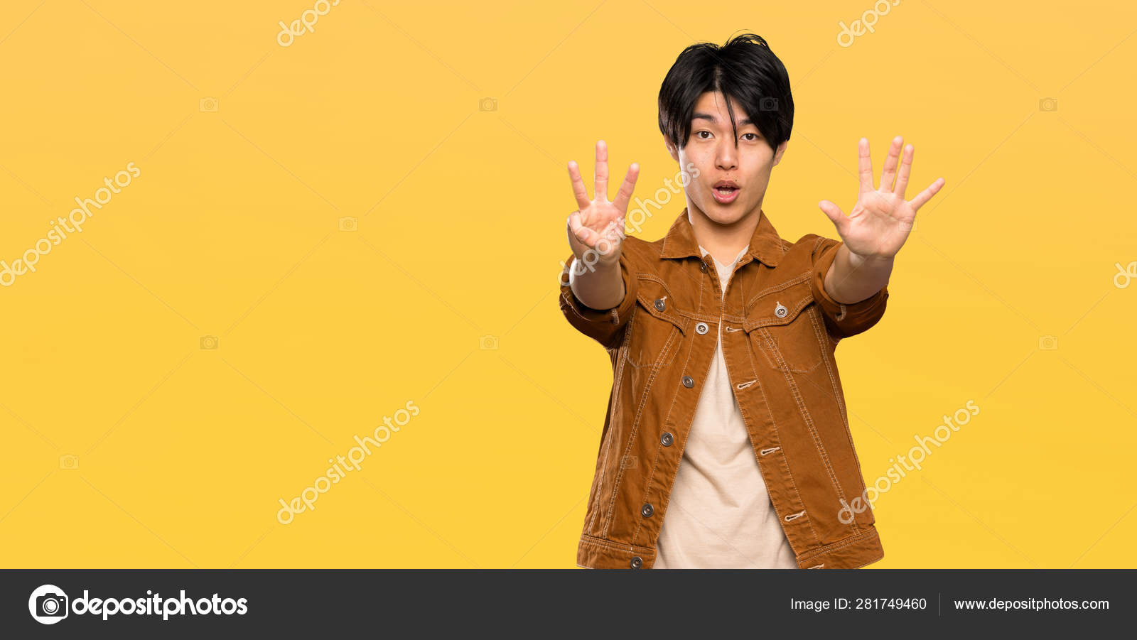 Asian Man Brown Jacket Counting Eight Fingers Isolated Yellow ...