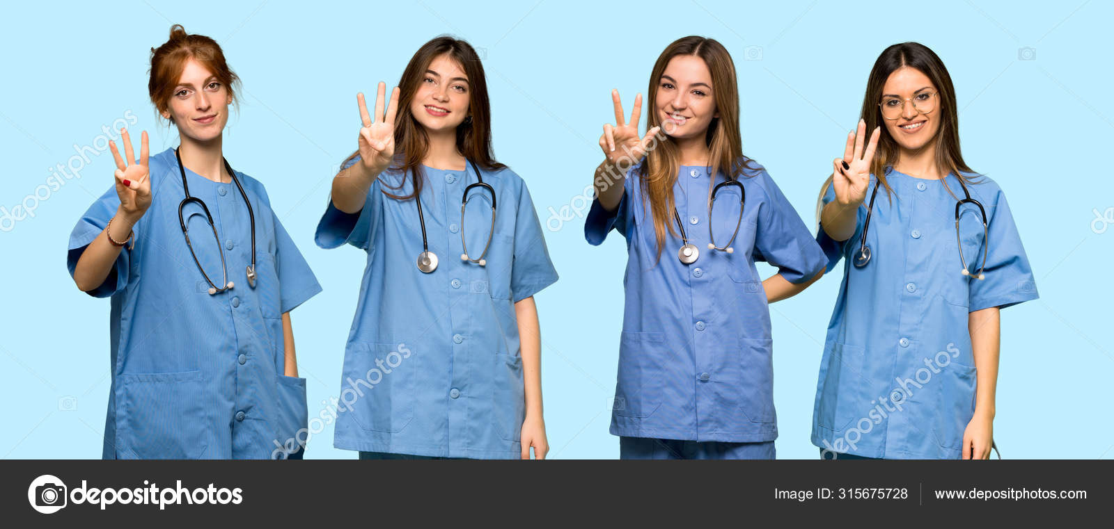 Group Nurses Happy Counting Three Fingers — Stock Photo © luismolinero ...