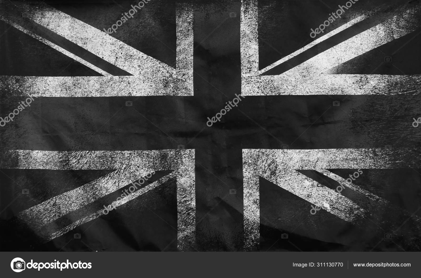 A monochrome full frame image of an old stained dirty union jack ...
