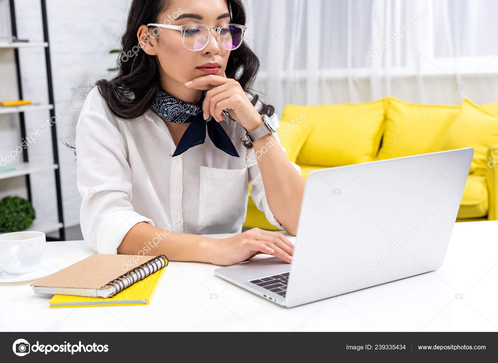 Beautiful Thoughtful Asian Freelancer Using Laptop Holding Hand Chin ...