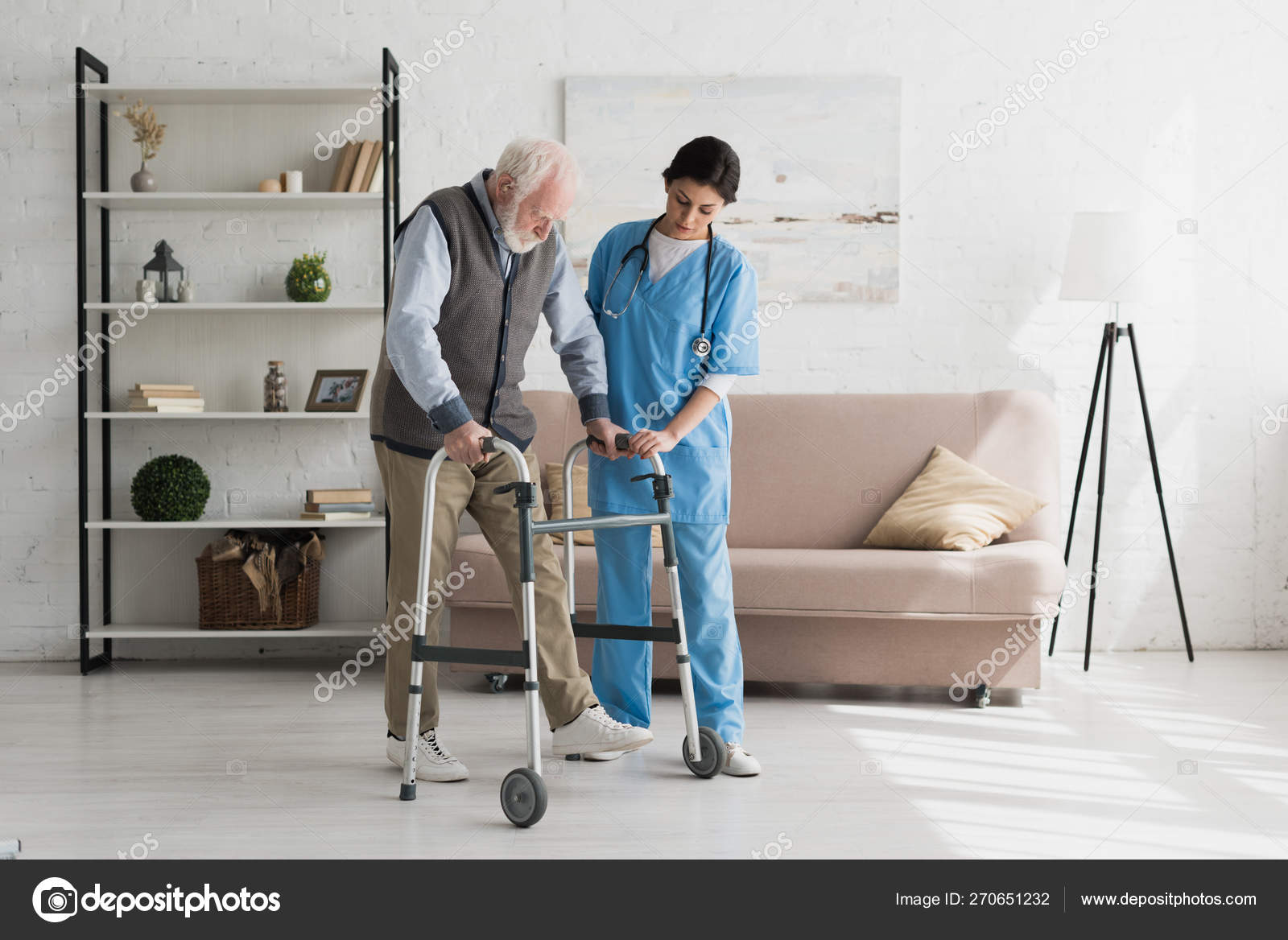 Nurse Helping Senior Man Walking Home Recovering Injury Stock Photo by ...