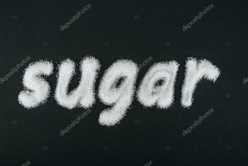 topi vista de la palabra azúcar hecha de cristales de azúcar blanco ...