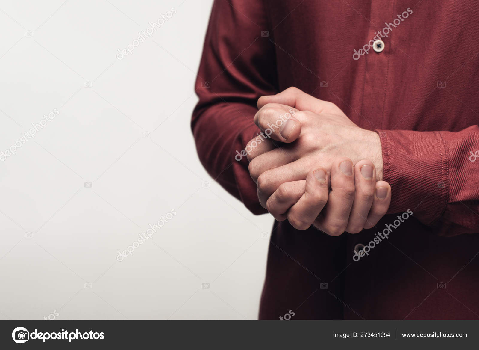 Hands Clenched Together