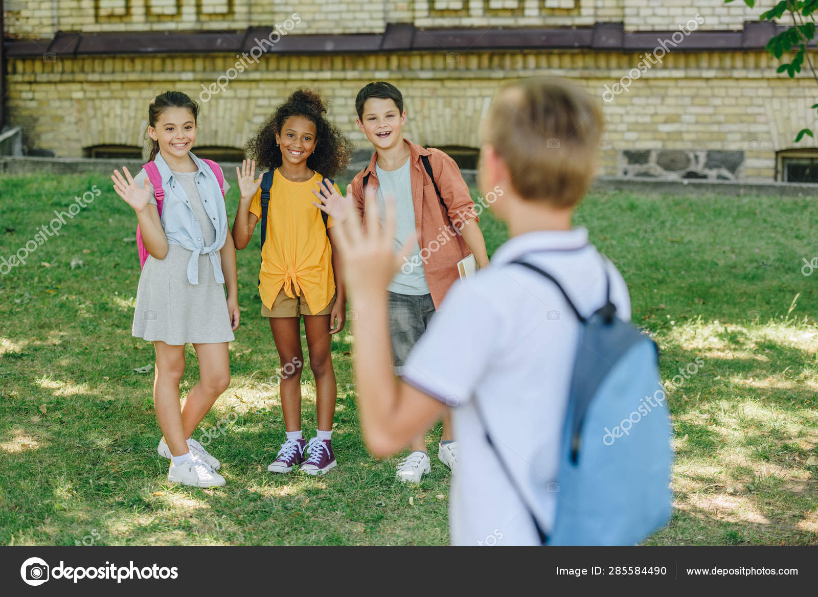 Back View Shoolboy Waving Hand Smiling Multicultural Friends — Stock ...