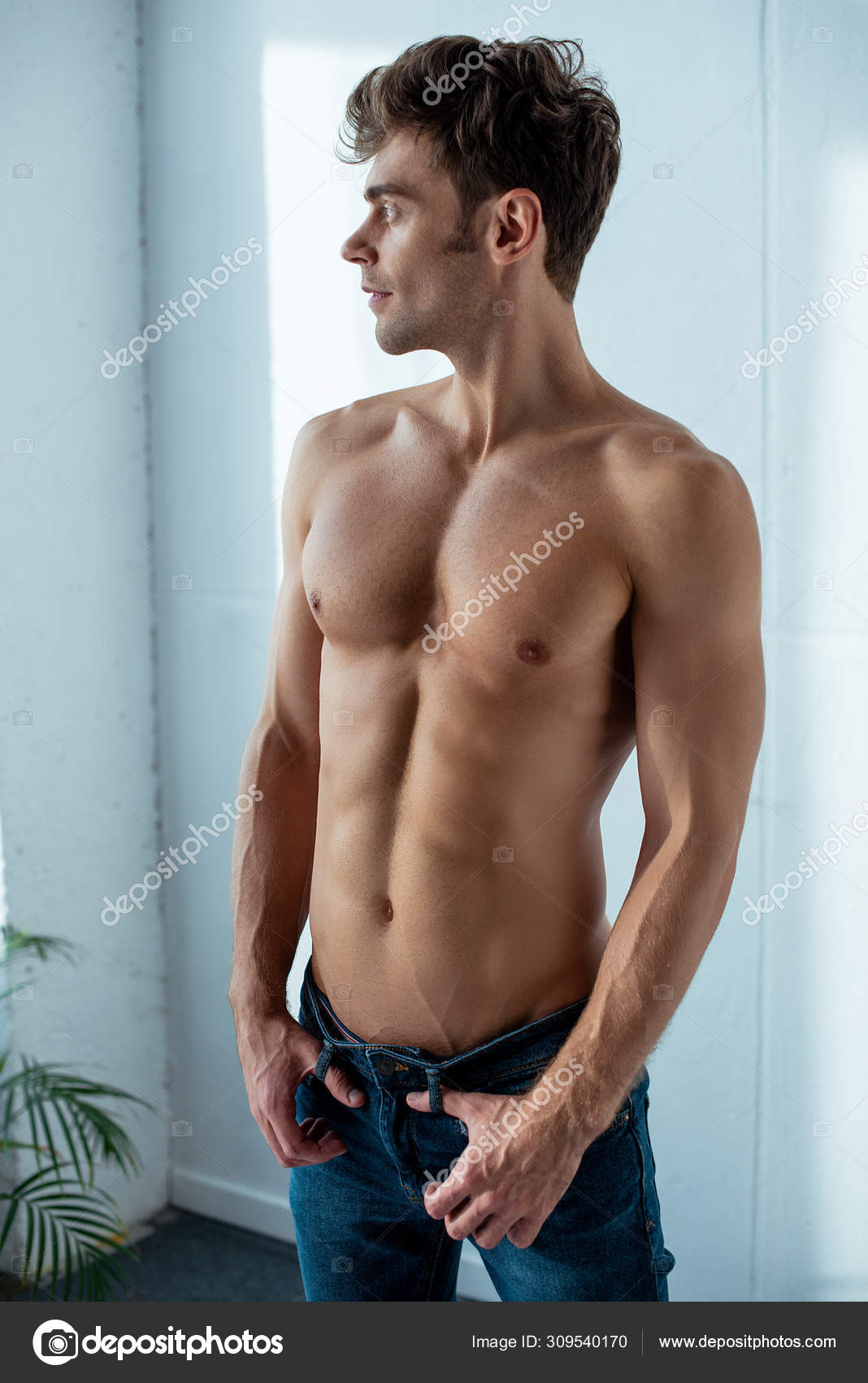 Handsome Shirtless Man Blue Denim Jeans Standing Bedroom Stock Photo by ... Handsome Shirtless Man Blue Denim Jeans Standing Bedroom Stock Photo by ...