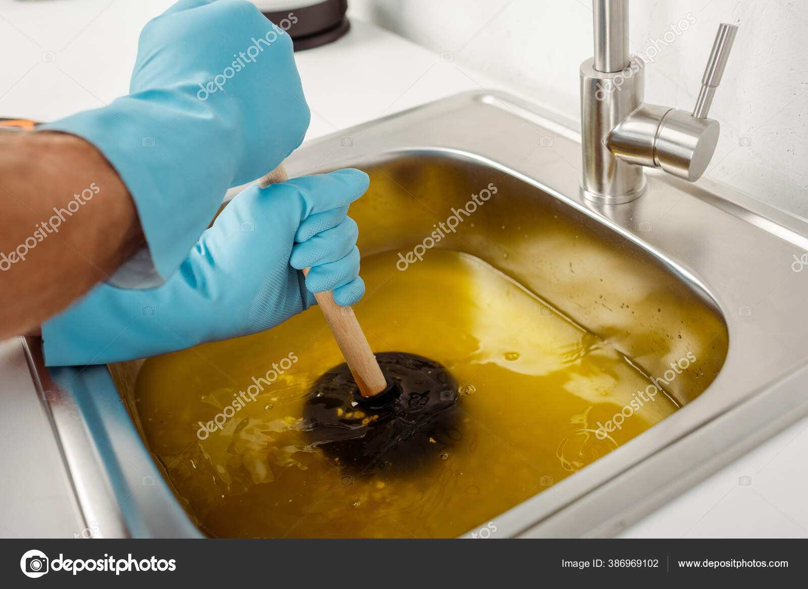 Cropped View Plumber Rubber Gloves Holding Plunger While Cleaning ...