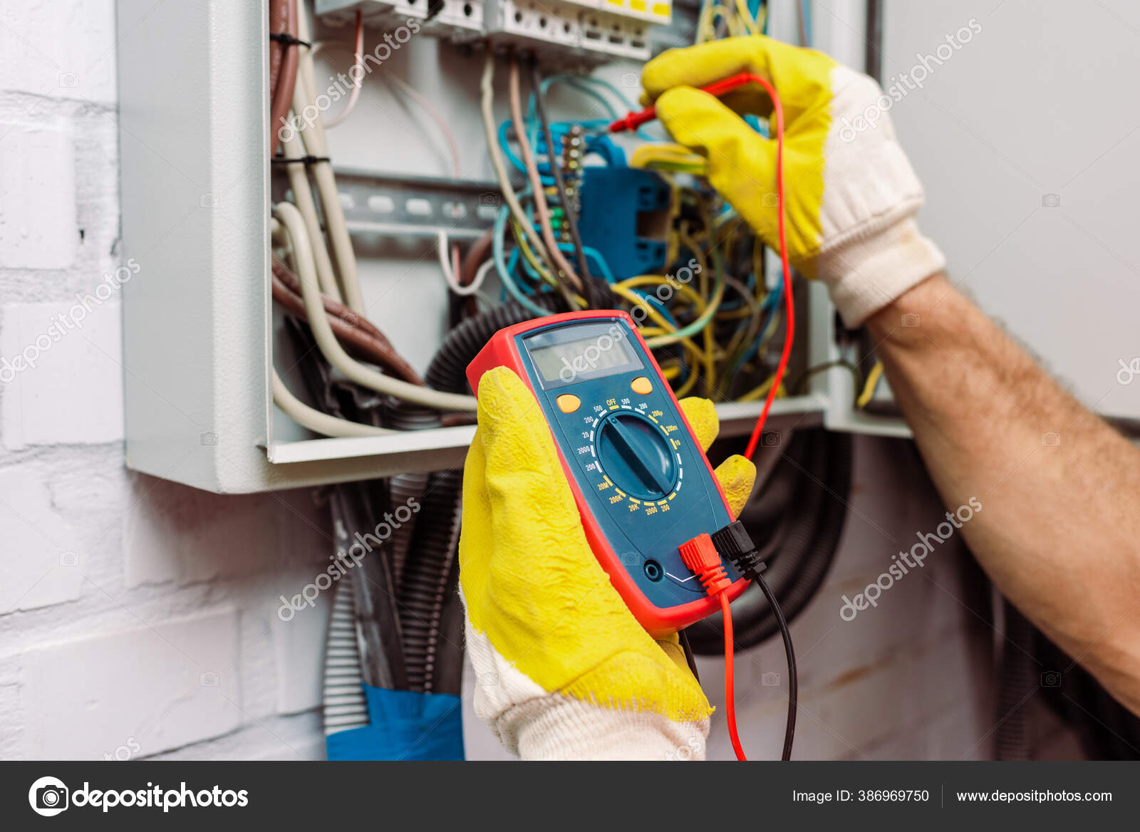 Cropped View Workman Gloves Using Multimeter While Checking Voltage ...