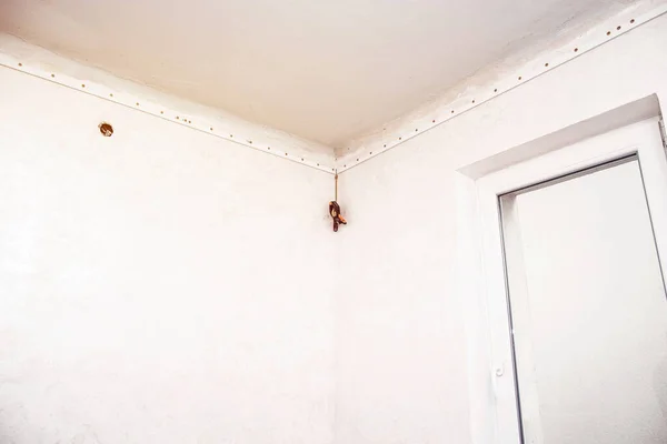 Installation of stretch ceiling. Installation of suspended ceilings in ...