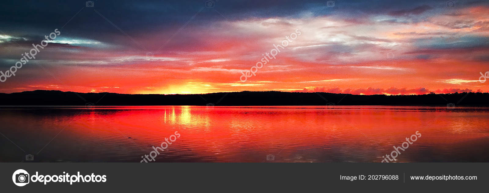 Striking Inspirational Red Colored Cloudy Sunrise Seascape Sea Water ...