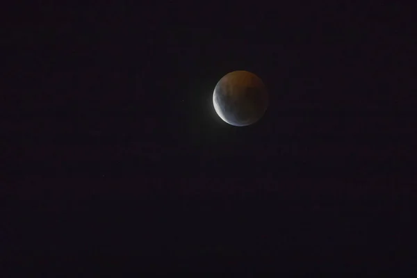 Red full Moon eclipse from Santiago de Chile city, a view from the ...