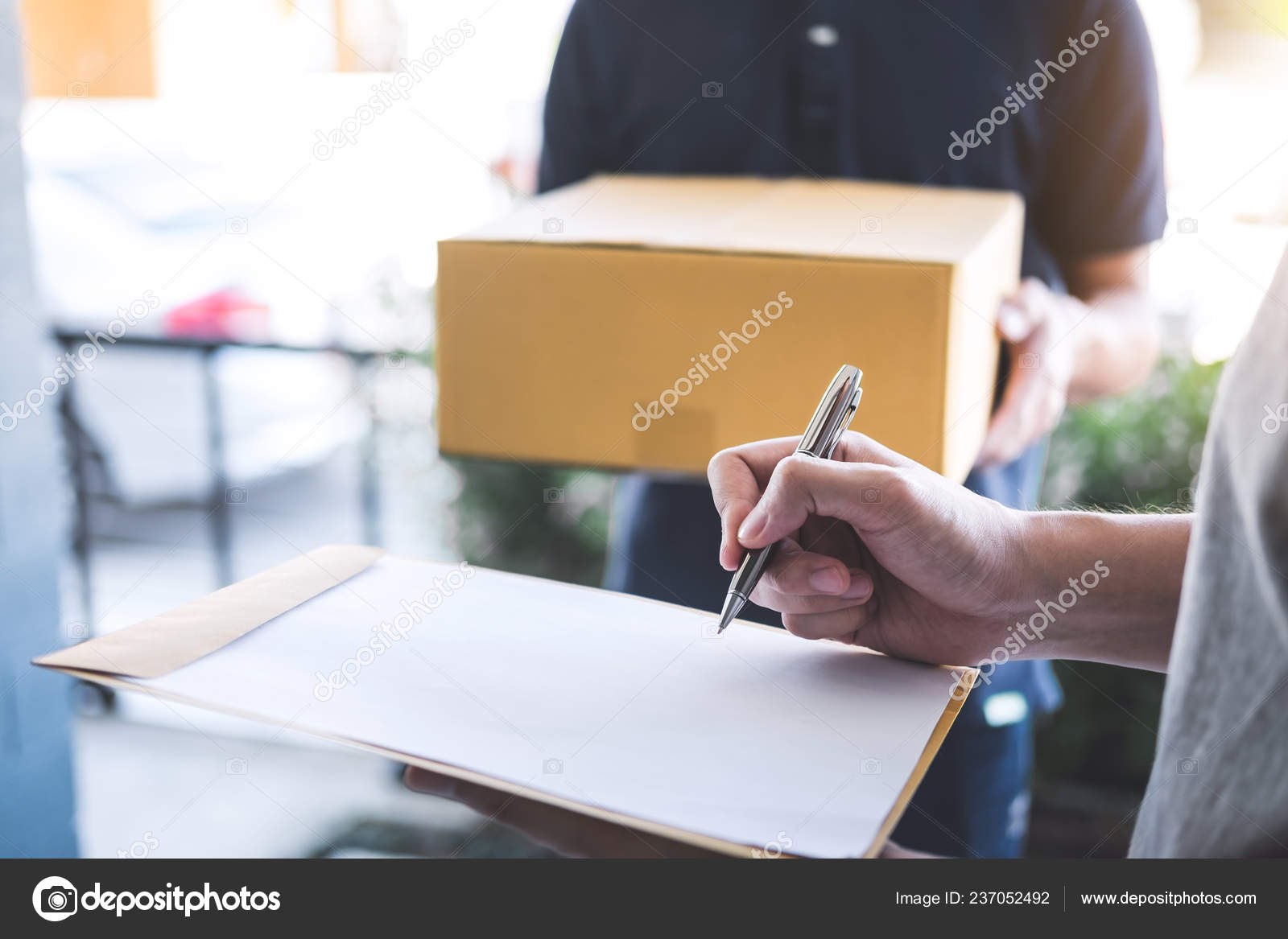 Delivery Mail Man Giving Parcel Box Recipient Signature Form Young ...