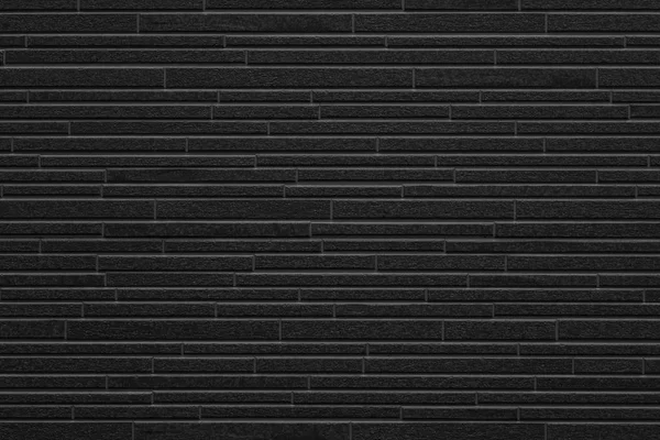 Modern black stone tile wall pattern and background - Stock Image ...