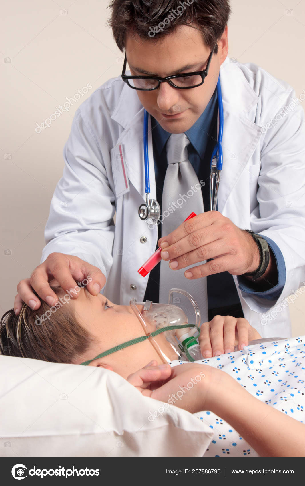 Doctor Shining Light Patient Eyes Checkup Examination Stock Photo by ...