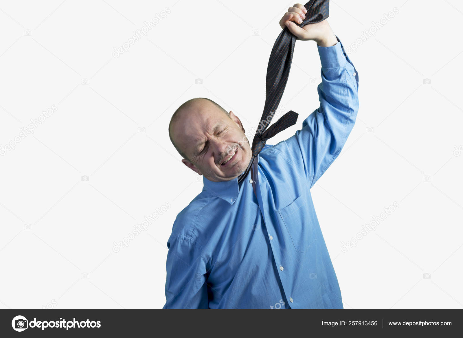 Man Choking Himself His Tie Stock Photo by ©YAYImages 257913456