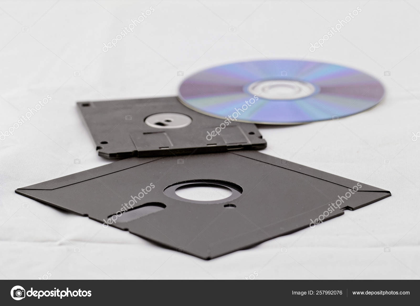 Old Fashion Floppy Disc Compact Disc Dvd Dvd — Stock Photo © YAYImages ...