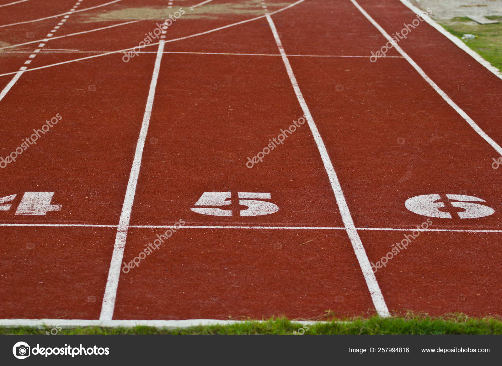 Racing Lanes Numbers — Stock Photo © YAYImages #257994816