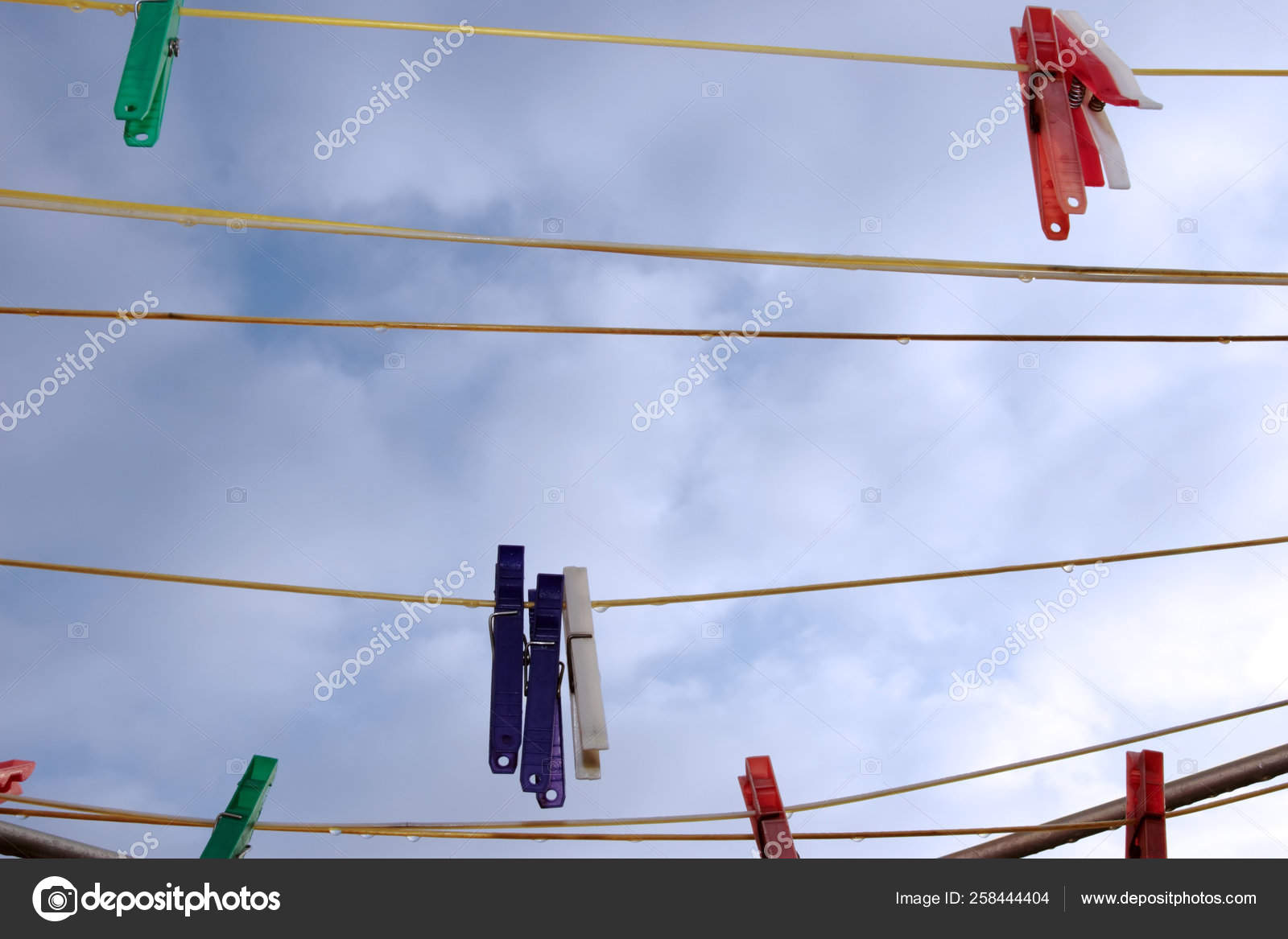 Assorted Color Pegs Wet Washing Line Stock Photo by ©YAYImages 258444404