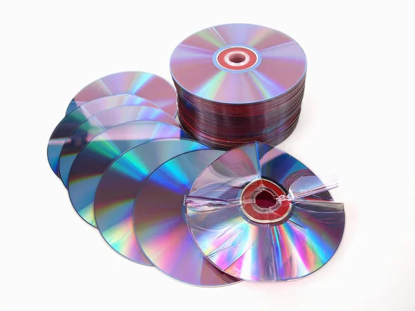 Stack of Cd or DVD roms isolated — Stock Photo © InvisibleViva #1404512