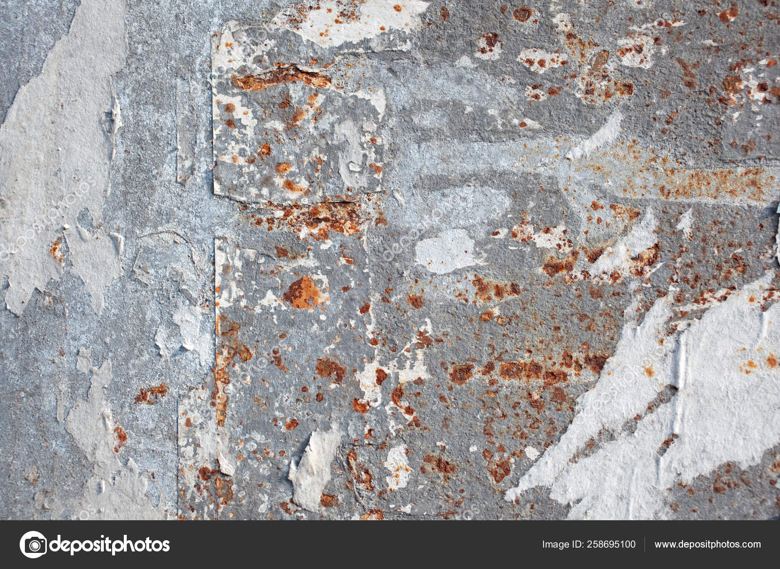 Torn Posters Iron Surface Stock Photo by ©YAYImages 258695100