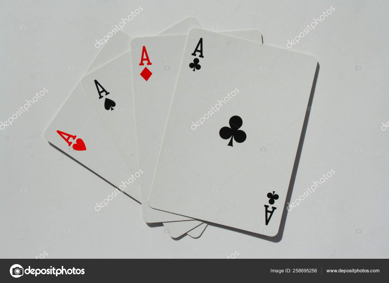 Close Four Aces White Background — Stock Photo © YAYImages #258695256