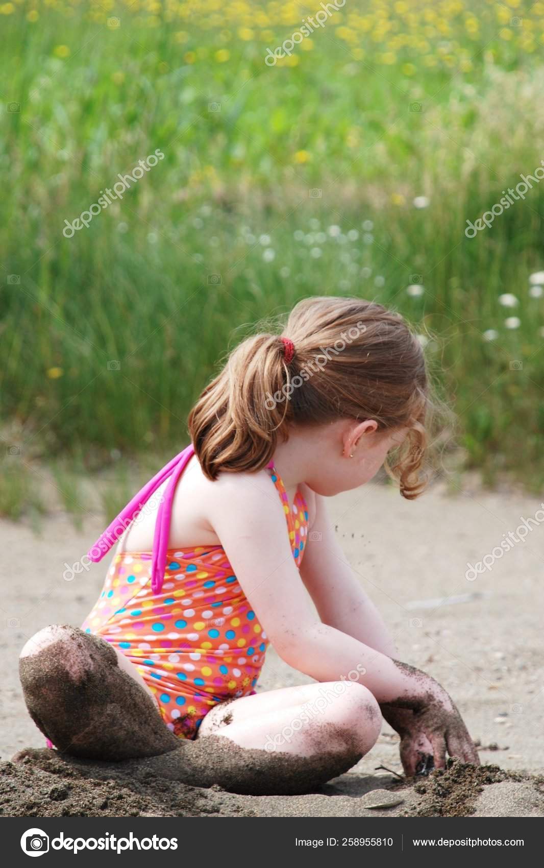 Child Playing Sand Stock Photo by ©YAYImages 258955810