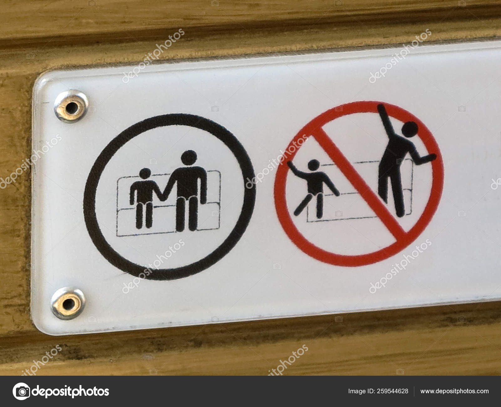 Safety Sign Asking Passengers Sit Stock Photo by ©YAYImages 259544628