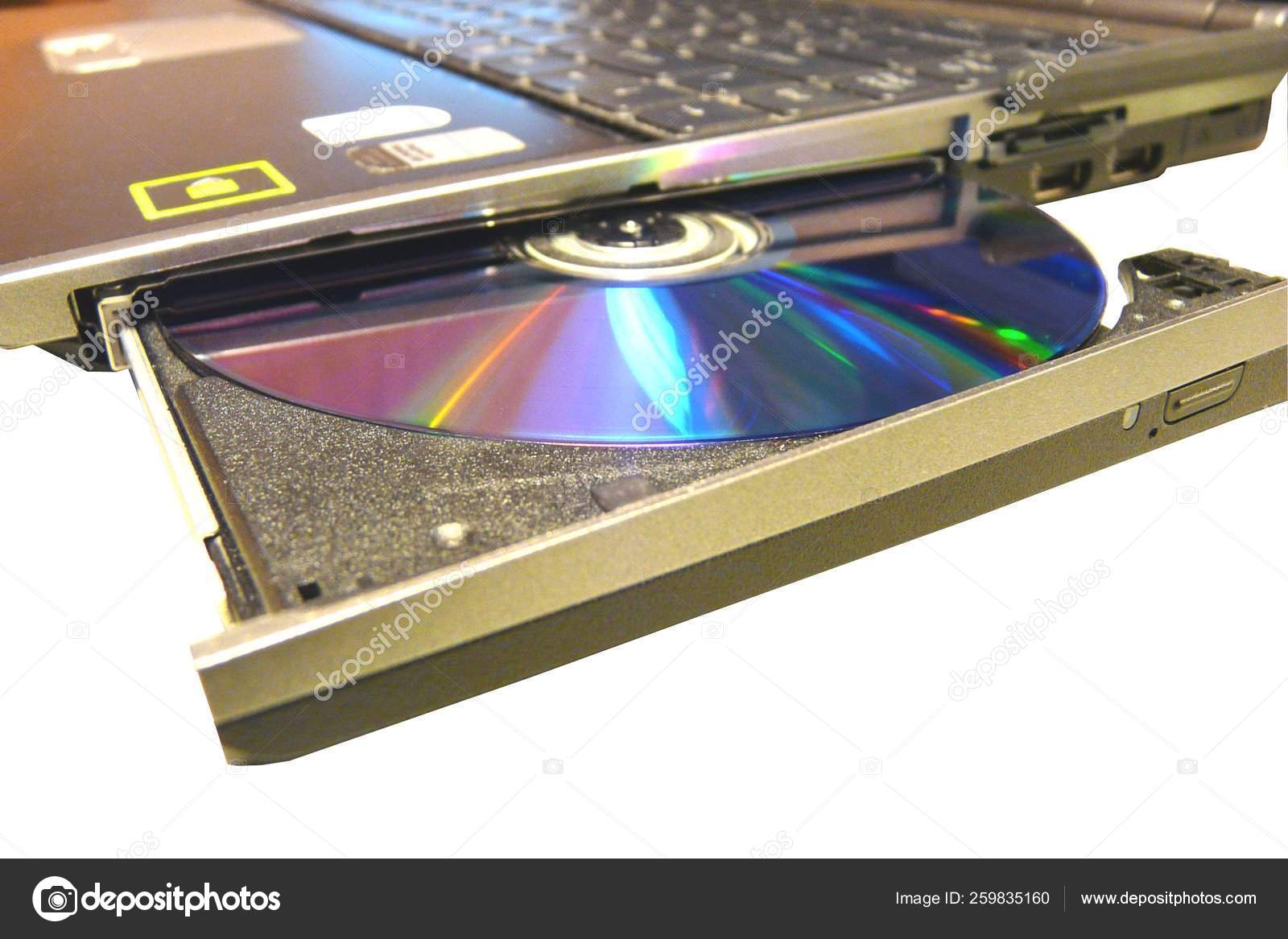 Dvd Disk Laptop Stock Photo by ©YAYImages 259835160