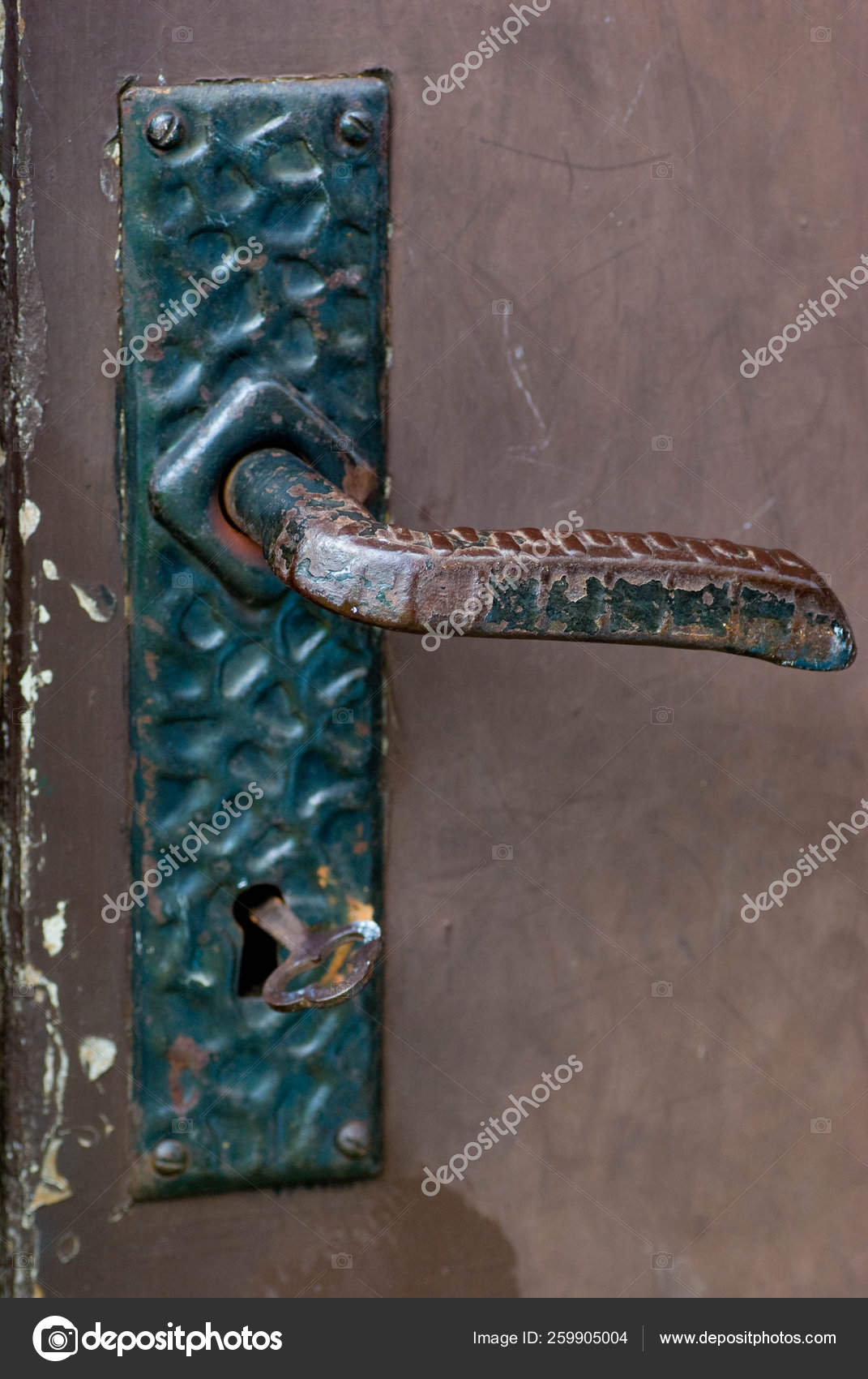 Old Iron Door Handle Key Lock Stock Photo by ©YAYImages 259905004