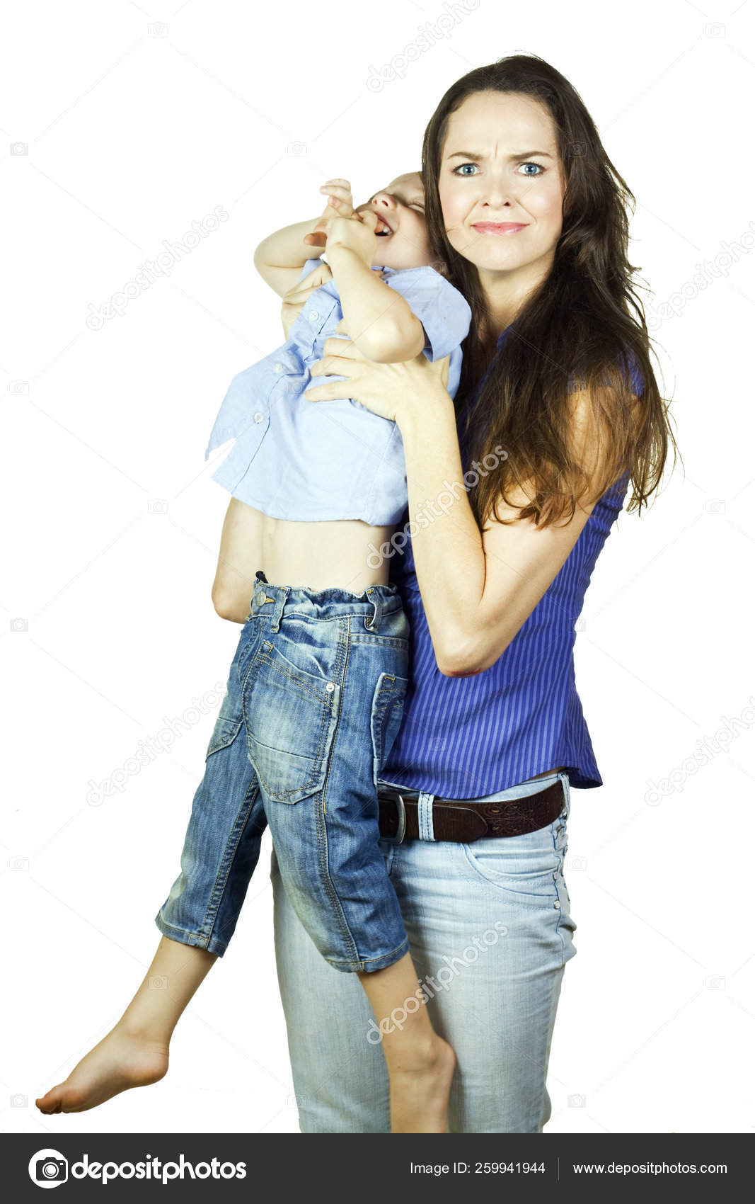 Young Mother Holding Screaming Squirming Toddler Stock Photo by ...