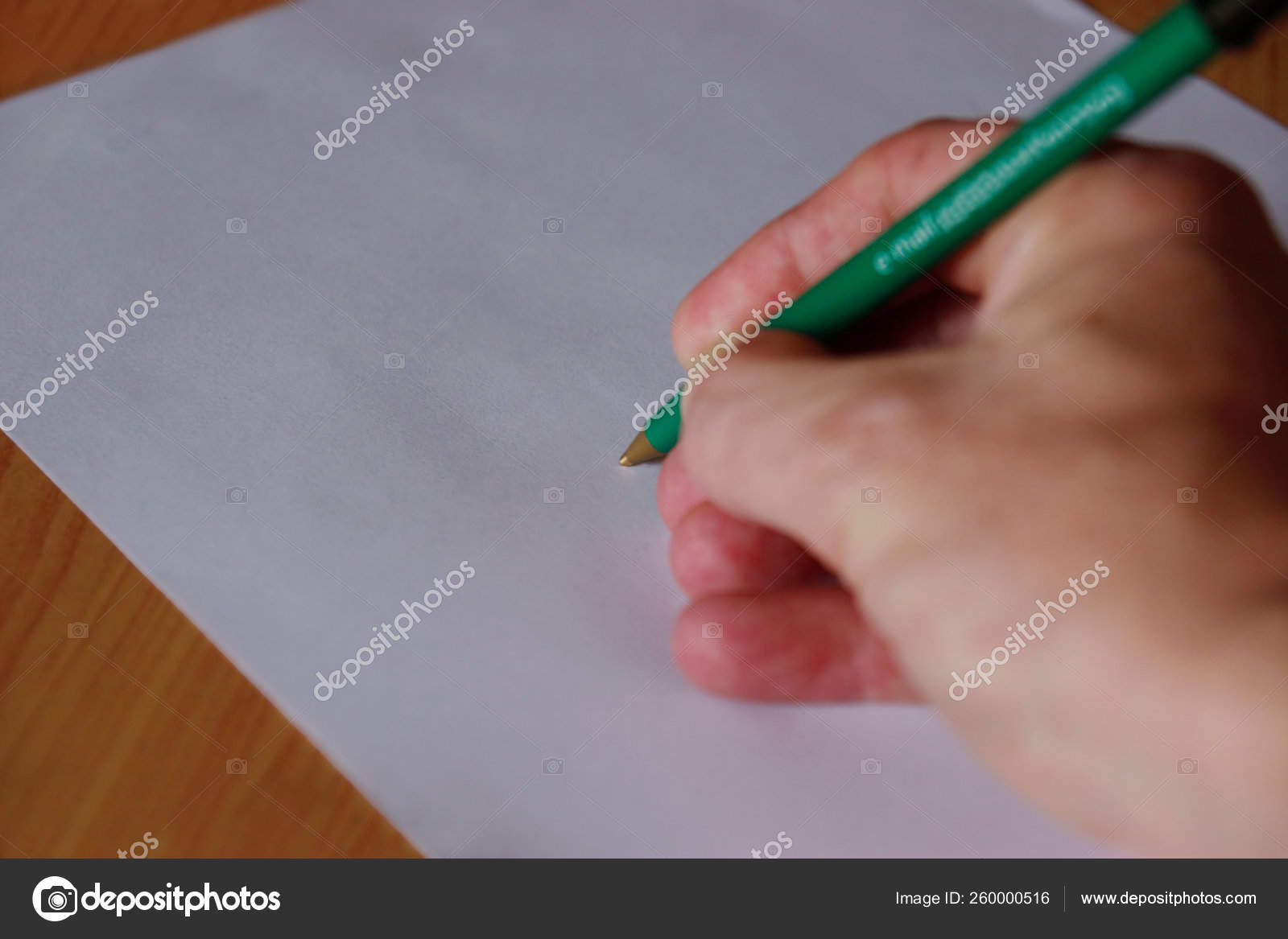 Pen Hand Write Paper Stock Photo by ©YAYImages 260000516