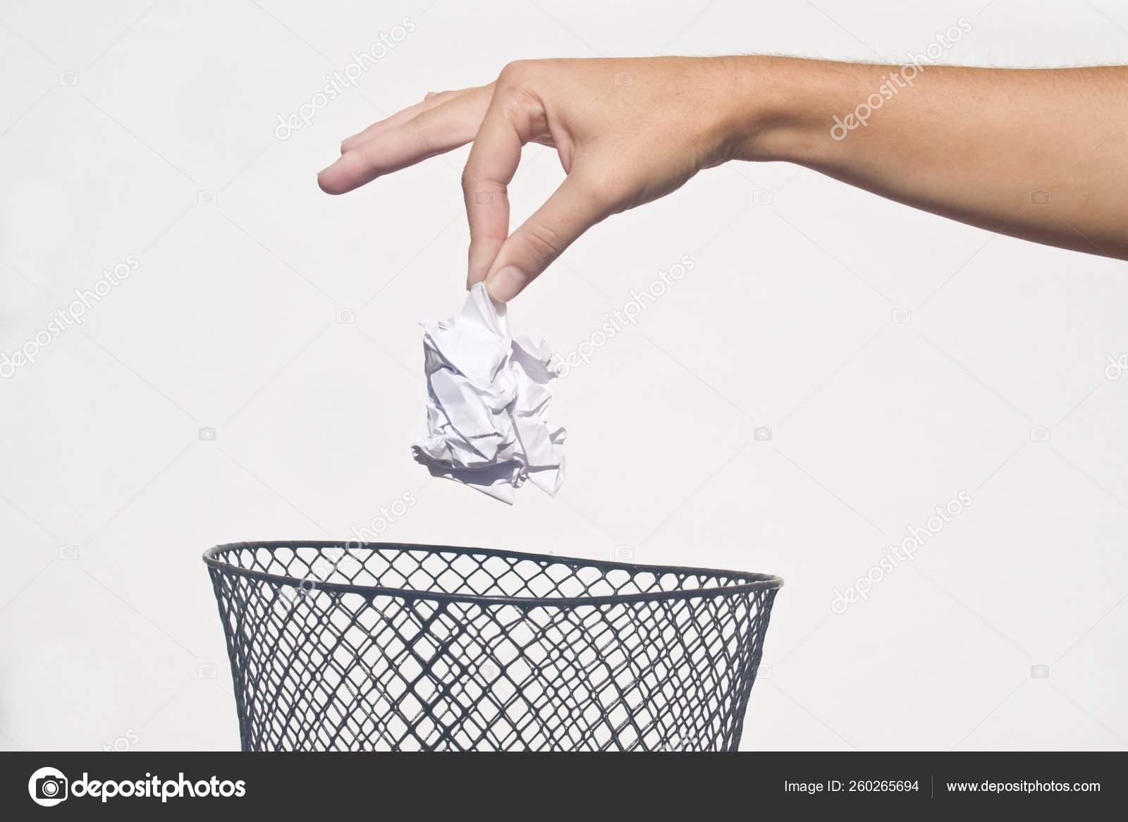 Detail Hand Dropping Crumpled Paper Wire Basket Stock Photo by ...