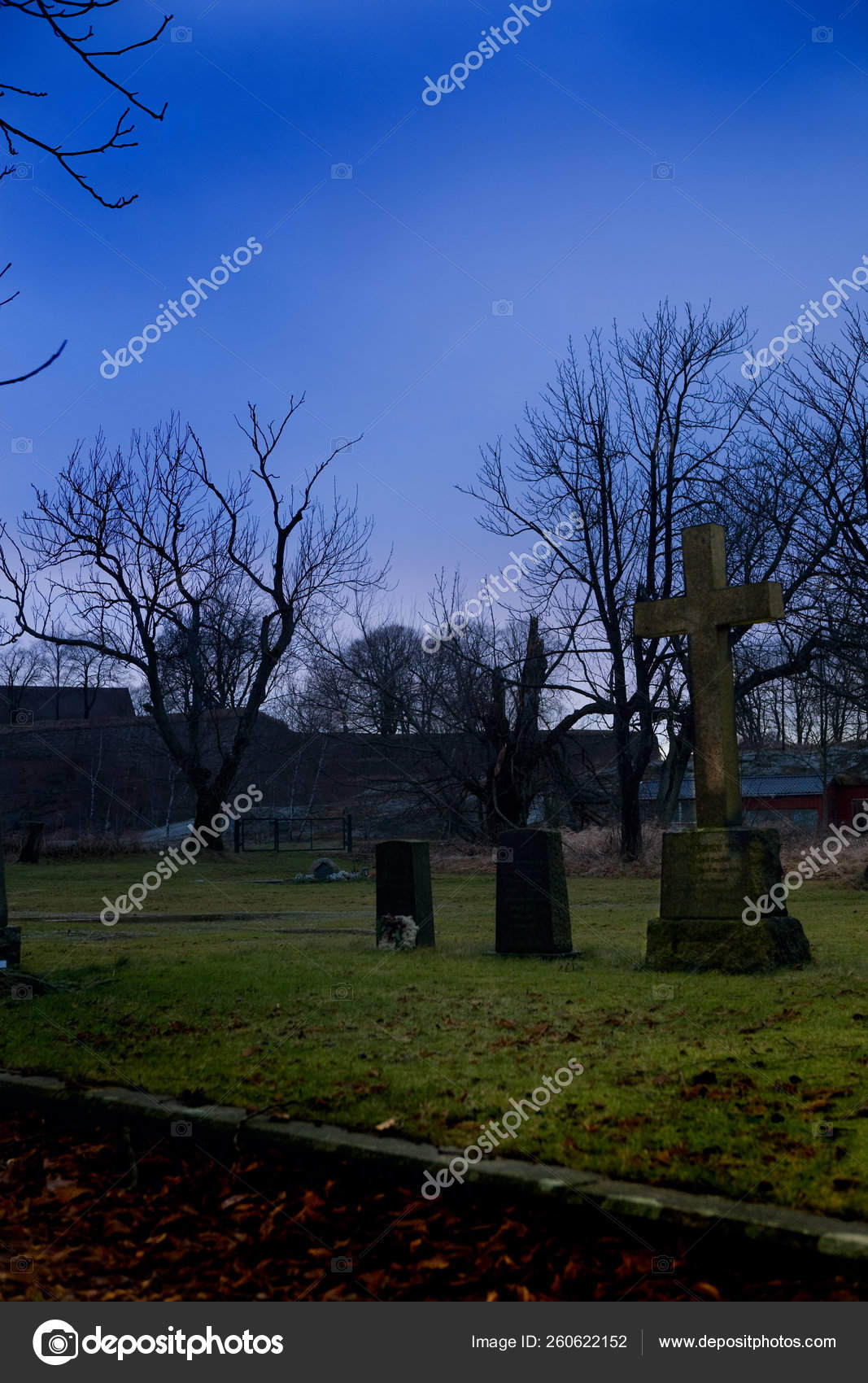 Spooky Graveyard Deep Blue Sky Stock Photo by ©YAYImages 260622152