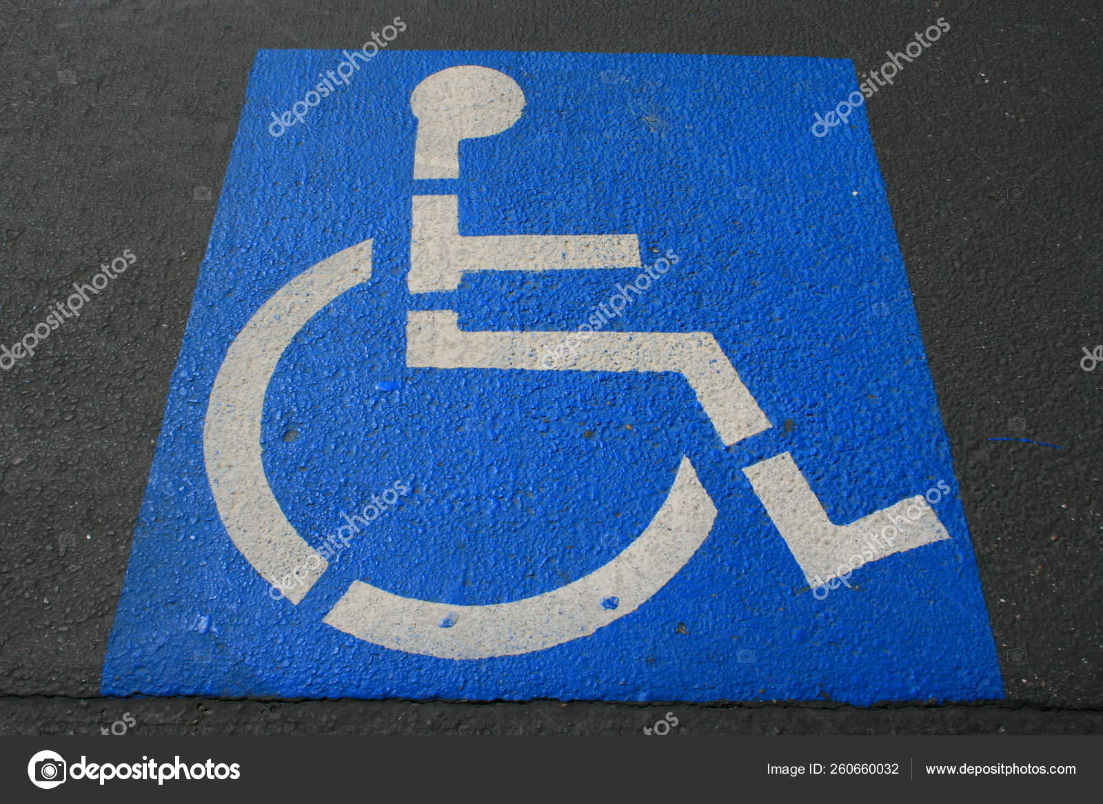 Close Handicap Sign Pavement Stock Photo by ©YAYImages 260660032
