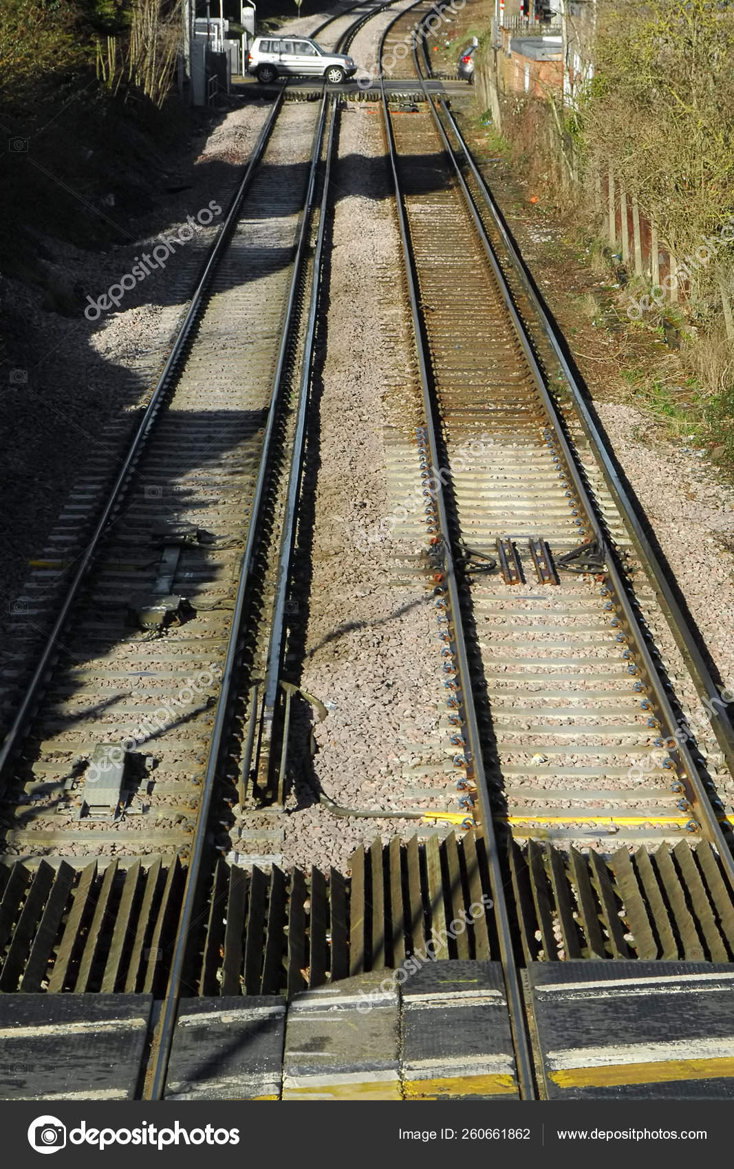 Double Railroad Crossing Distant Vehicle Tracks Stock Photo by ...