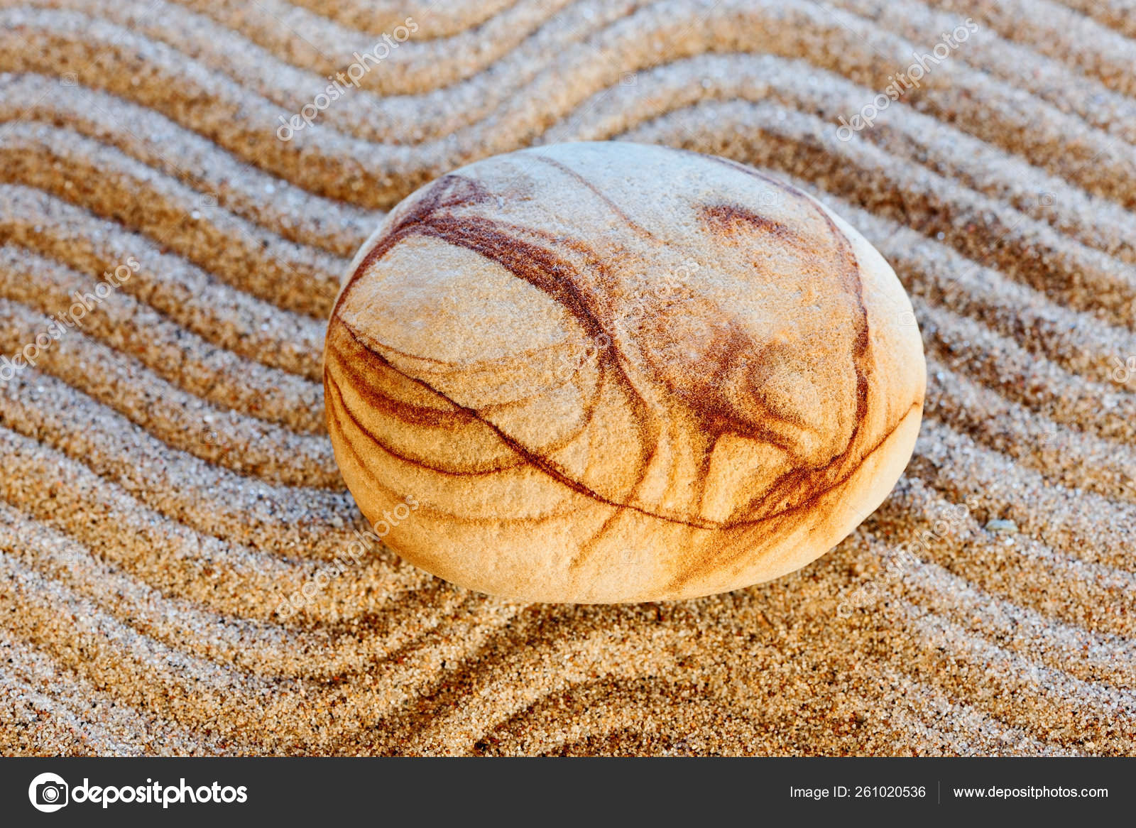 Beautiful Figured Stone Easy Lays Sand Stock Photo by ©YAYImages 261020536