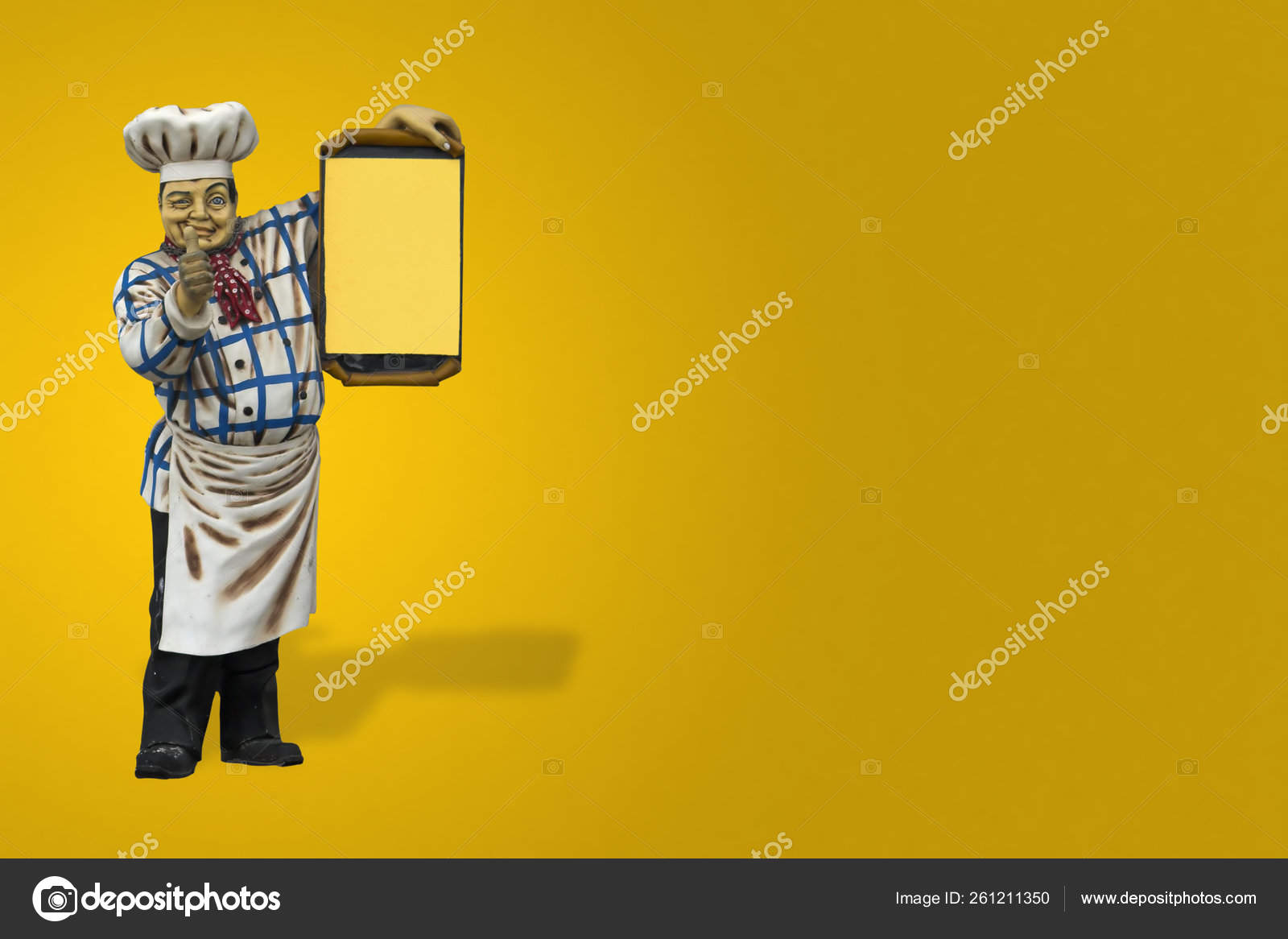 Statue Man Showing Menu Restaurant Stock Photo by ©YAYImages 261211350