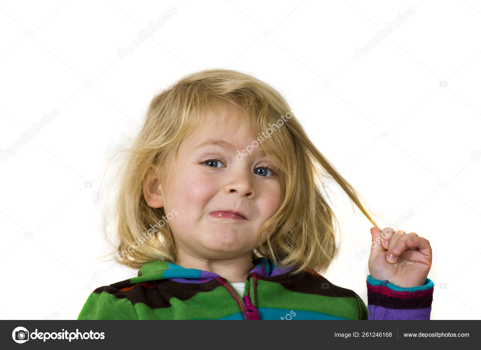Puzzled Little Girl Pulling Her Hair Stock Photo by ©YAYImages 261246168