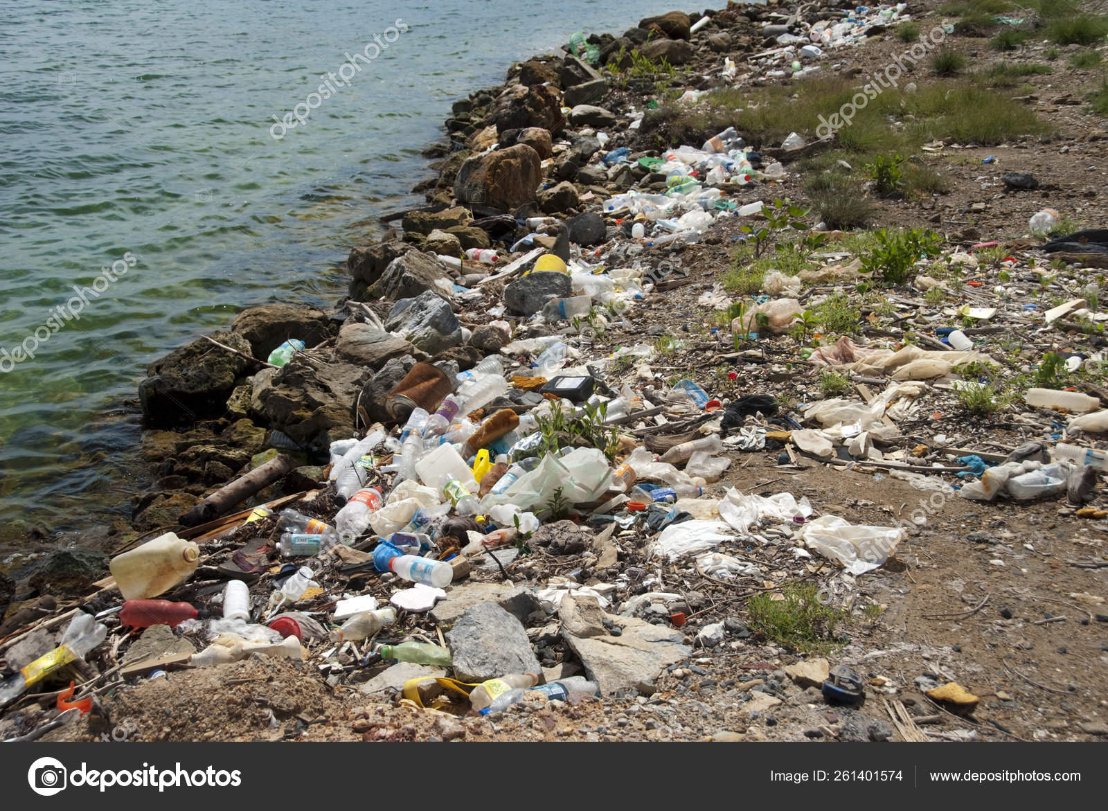 Garbage Trash Dumped Water Supply — Stock Photo © YAYImages #261401574