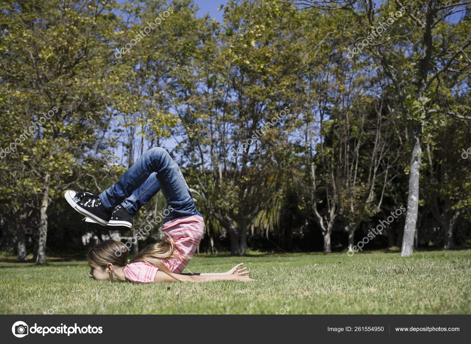 Portrait Tween Girl Doing Gymnastics Lawn Stock Photo by ©YAYImages ...