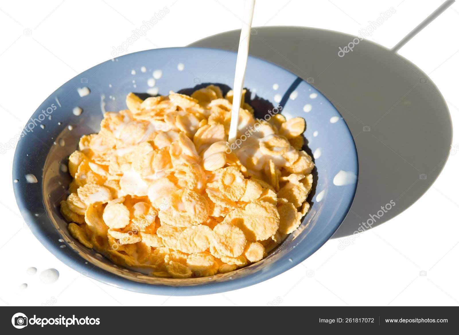 Milk Flows Plate Corn Flakes Stock Photo by ©YAYImages 261817072