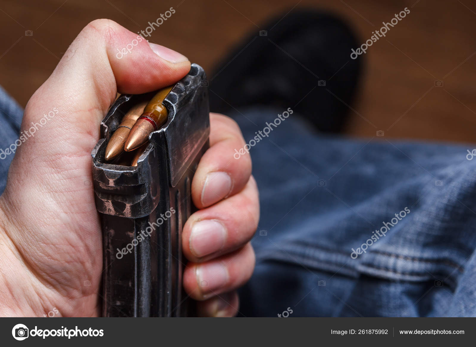 Loading Ammo Magazine Machine Guns Hand Stock Photo by ©YAYImages 261875992
