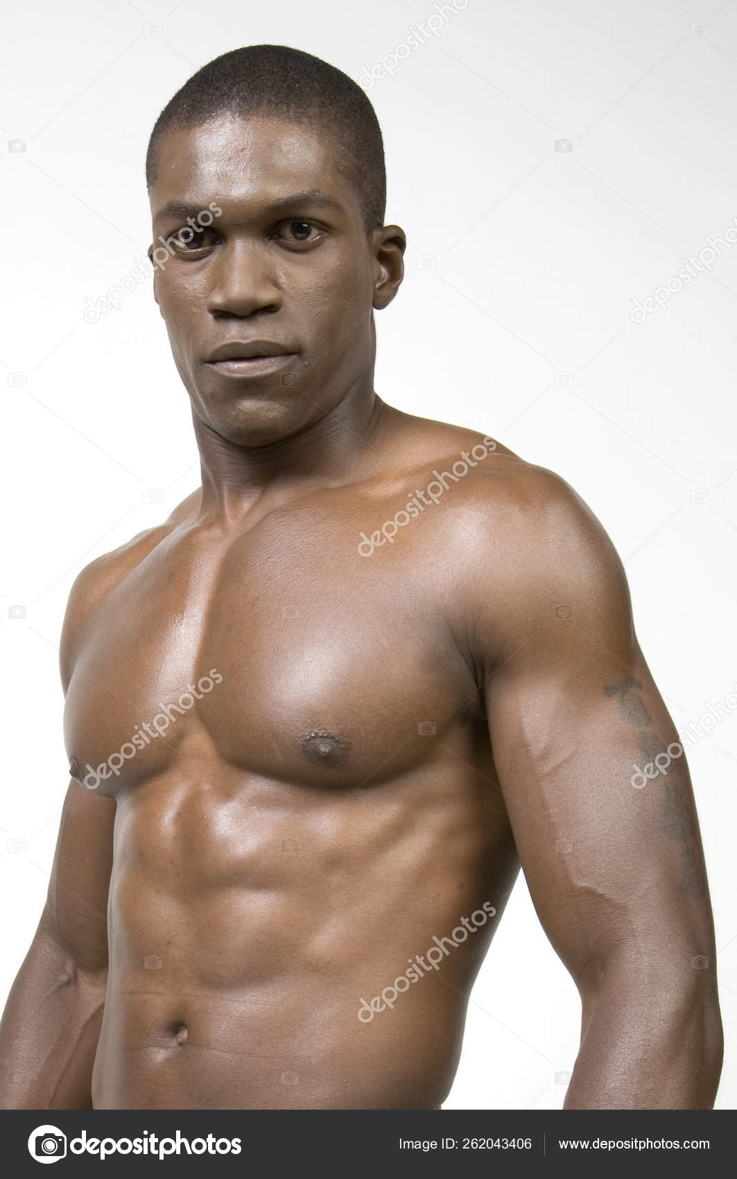 Muscular Black Man Shows Some Musce Stock Photo by ©YAYImages 262043406