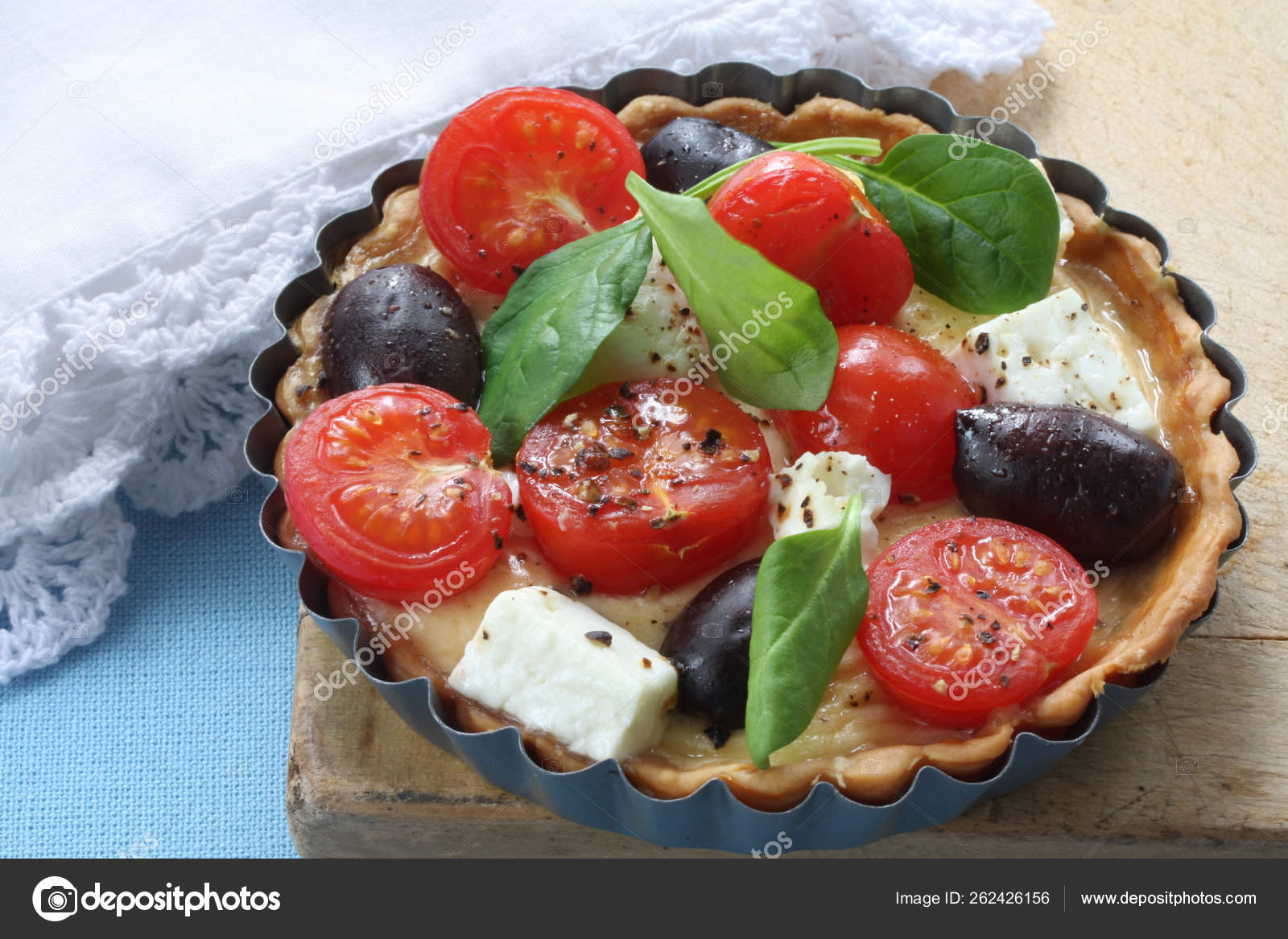 Small Flan Tart Topped Goat's Cheese Cherry Tomatoes Black Olives Stock ...