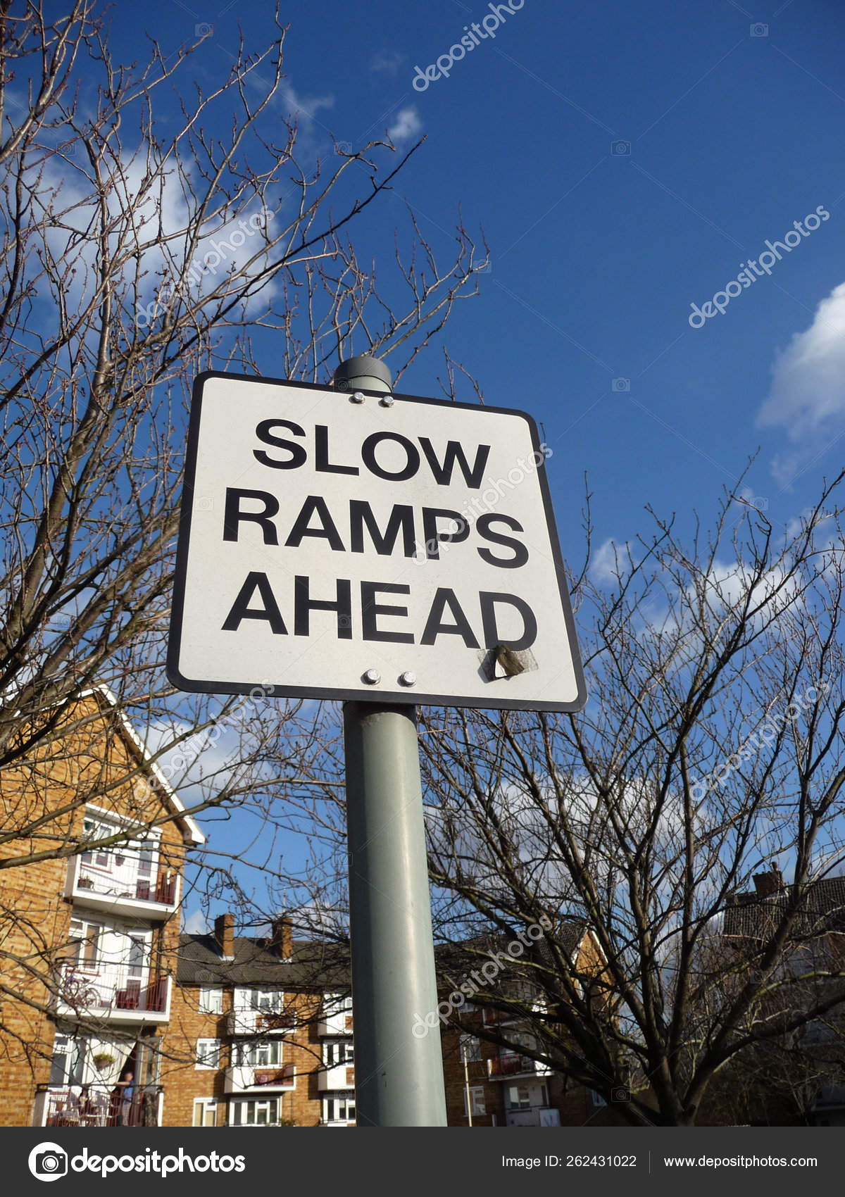 Slow Ramp Warning Sign Stock Photo by ©YAYImages 262431022