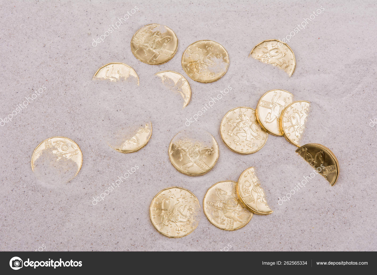 Gold Coins Grey Sand Background Stock Photo by ©YAYImages 262565334