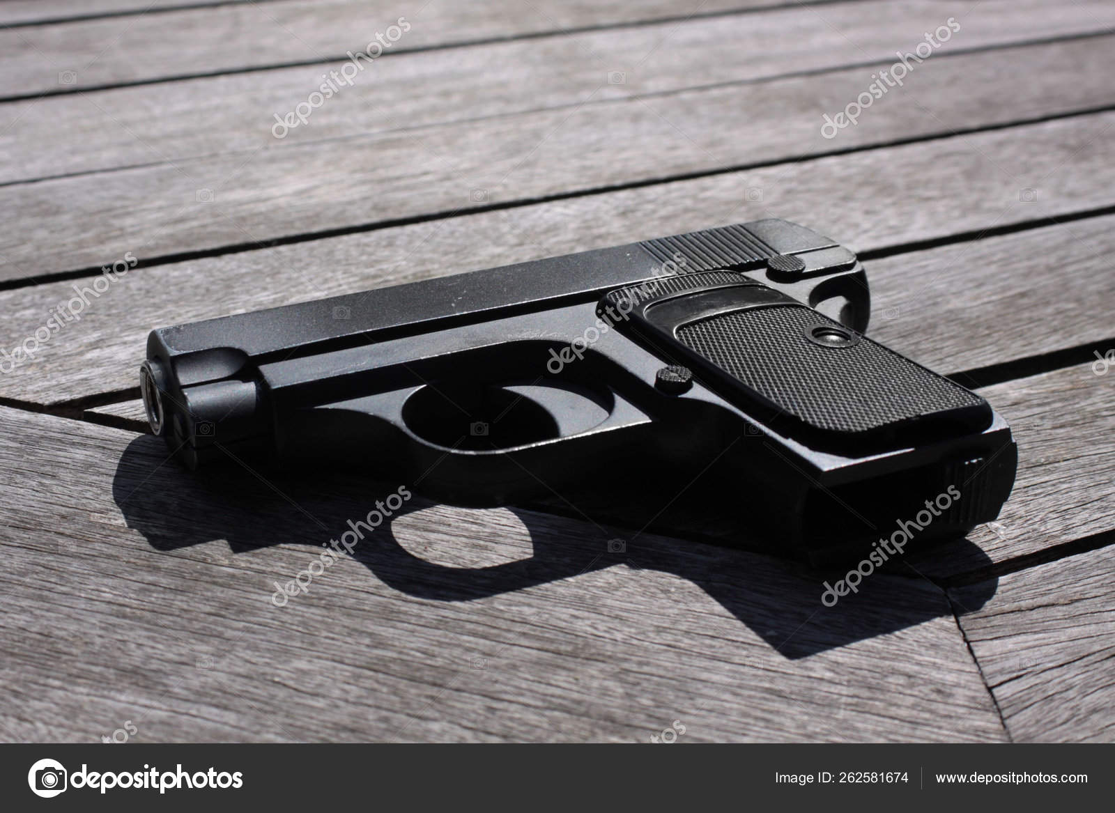Small Black Hand Gun Gun Set Wooden Table Landscape Format Stock Photo ...