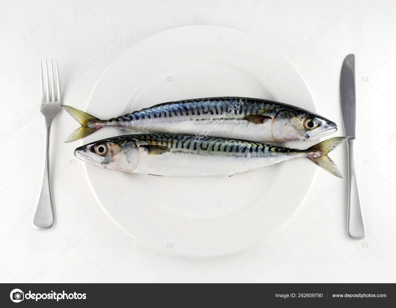 Two Mackerel White Plate Knife Fork Stock Photo by ©YAYImages 262609790