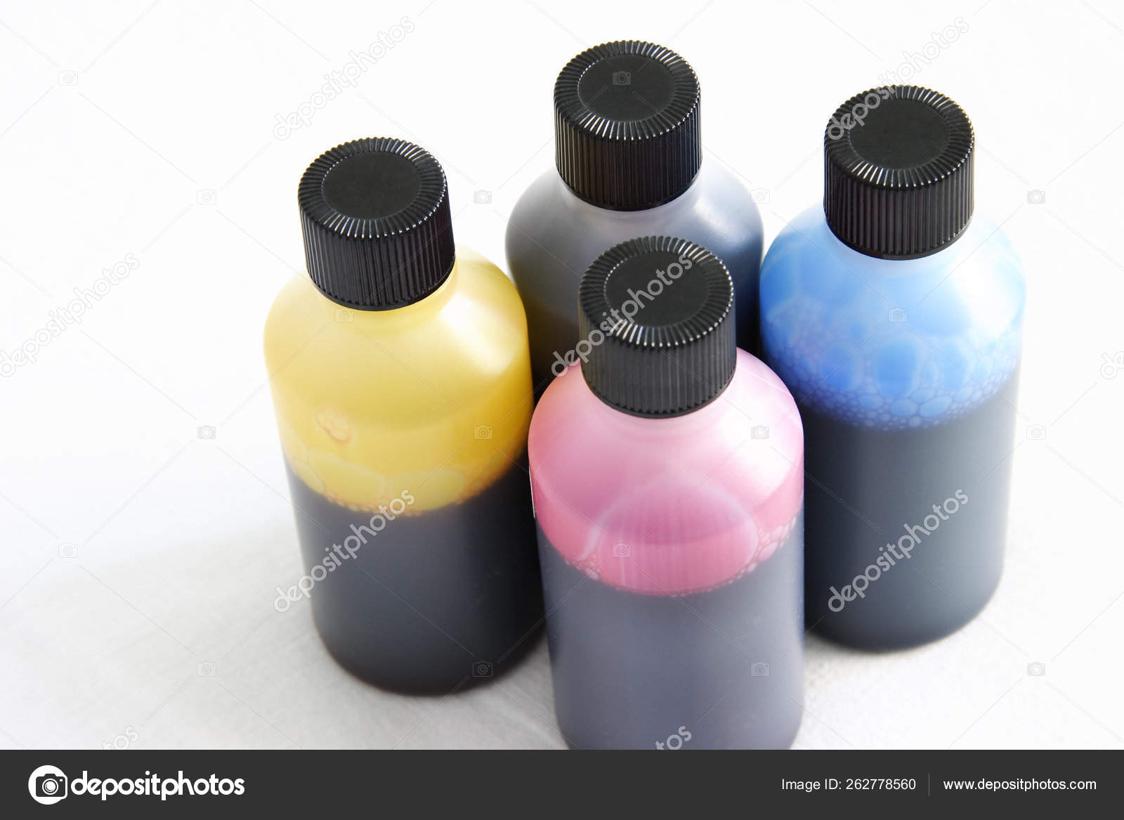 Four Plastic Bottles Different Coloured Ink Each Stock Photo by ...